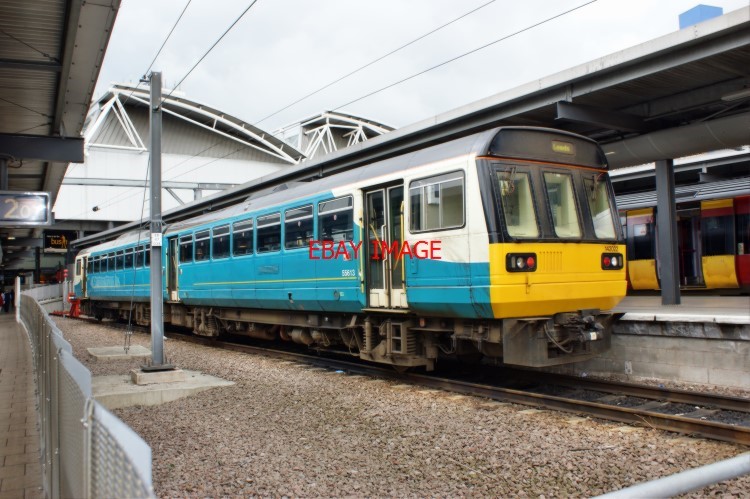 PHOTO CLASS 142 PACER 2-CAR DMU NO 144 011 AT LEEDS OF NORTHERN RAIL IN ...