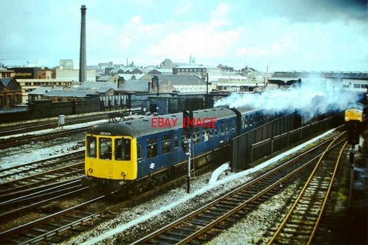 PHOTO 3-CAR DMU (CLASS 104) TAKEN FROM THE FOOTBRIDGE OF MANCHESTER ...